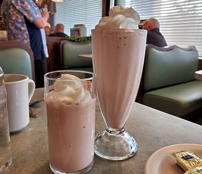 Milkshakes so thick they make your straw stand at attention. Whipped cream mountains worth conquering with every sip.