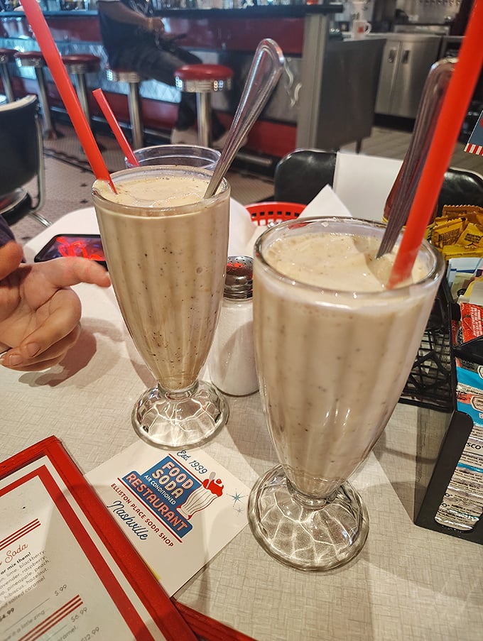 Milkshakes so thick they laugh at straws, served in glasses that remember when Elvis was just getting started.