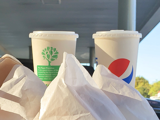 Two milkshakes sit ready for action, thick enough to require strategy and delicious enough to justify the effort.