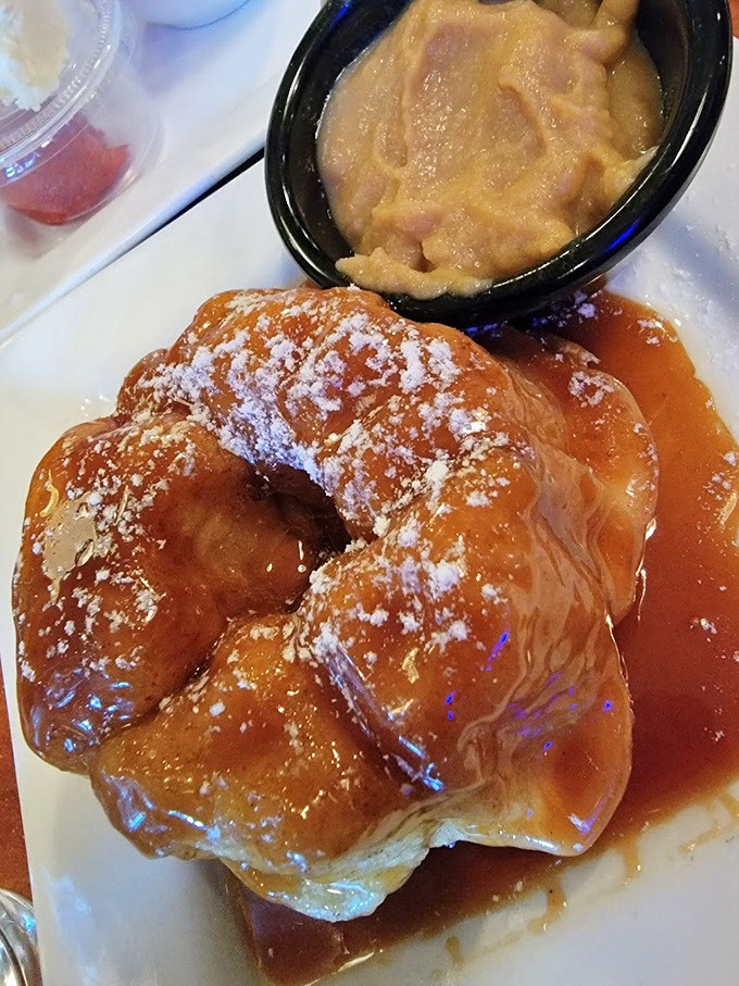 The monkey bread that launches a thousand cheat days. Glistening with caramel and dusted with powdered sugar, it's worth every extra minute on the treadmill.