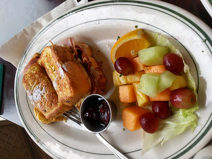 This Monte Cristo sandwich brings sweet and savory together in holy matrimony, with fresh fruit playing the role of colorful wedding guests.