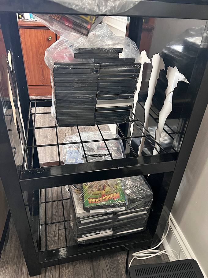 Physical media lives on! DVDs stacked like time capsules of entertainment history, waiting to fill a rainy weekend with nostalgia.