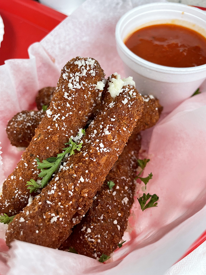 These mozzarella sticks aren't just appetizers&mdash;they're golden-brown ambassadors of cheese, wearing a crispy uniform and reporting for delicious duty.