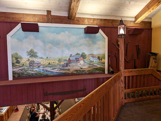 The rustic mural overlooking diners tells stories of simpler times, while exposed wooden beams remind you that craftsmanship never goes out of style.
