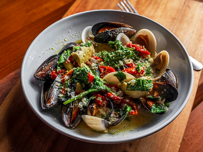 Mussels and clams swimming in a broth so good you'll be plotting how to drink it without anyone noticing. Spoiler: Everyone notices.