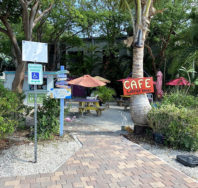 The Lobster Shack Caf&eacute; beckons with tropical charm and the promise of shade &ndash; two precious commodities in the Florida sun.