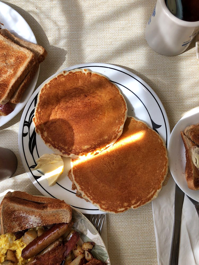 Golden pancakes that achieve that mythical balance—crisp edges, fluffy centers—the breakfast equivalent of finding a parking spot right in front of your destination.