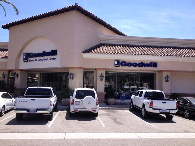 Even the parking lot maintains that coastal California vibe. The building's terracotta roof tiles and stucco finish whisper "upscale shopping" while prices shout "bargain!"