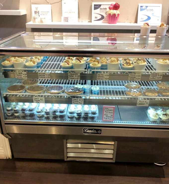 Dessert real estate at its finest. Each shelf offers a different neighborhood of sweet possibilities, no mortgage required.