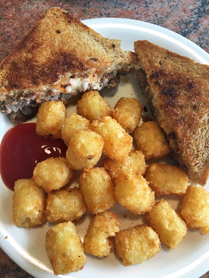 The patty melt and tater tots combo proves that sometimes the simplest pleasures&mdash;melted cheese, grilled bread, seasoned meat&mdash;are life's greatest luxuries.