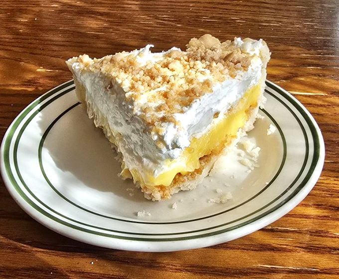 This isn't just pie&mdash;it's a cloud of banana cream heaven with a graham cracker foundation. Dessert engineering at its finest.