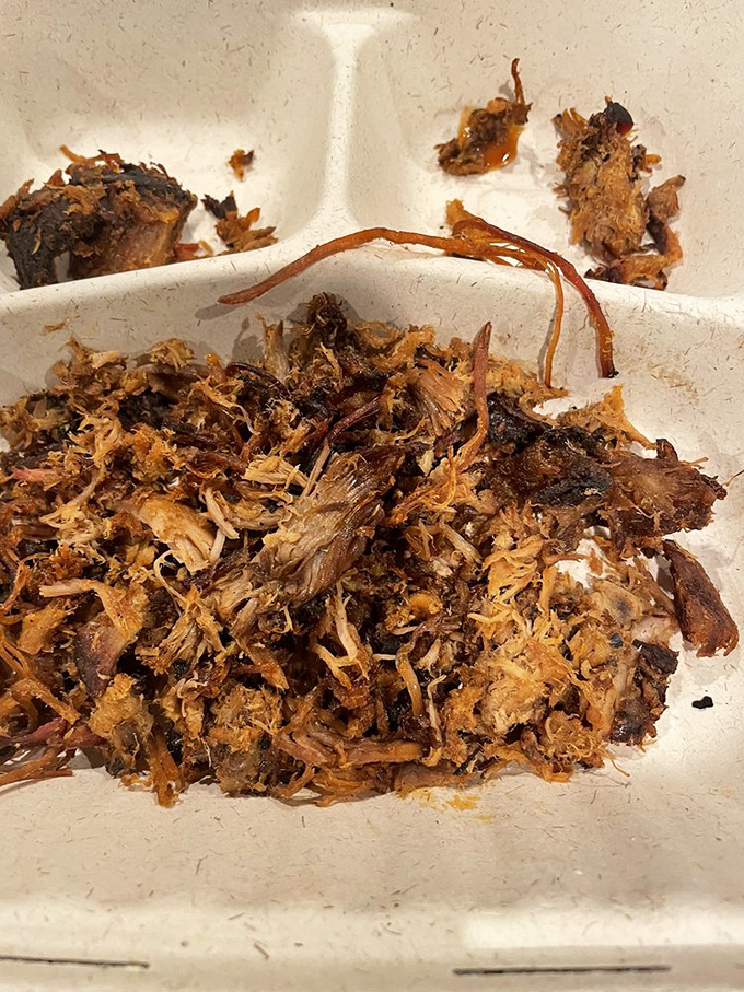 Behold the pulled pork in its natural habitat &ndash; tender, bark-flecked, and ready to make you question why you ever ate anything else.