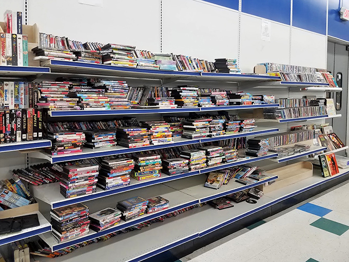 Media treasure trove! DVDs and CDs line these shelves like a physical Netflix of yesteryear, each disc a portal to entertainment at pocket-change prices.