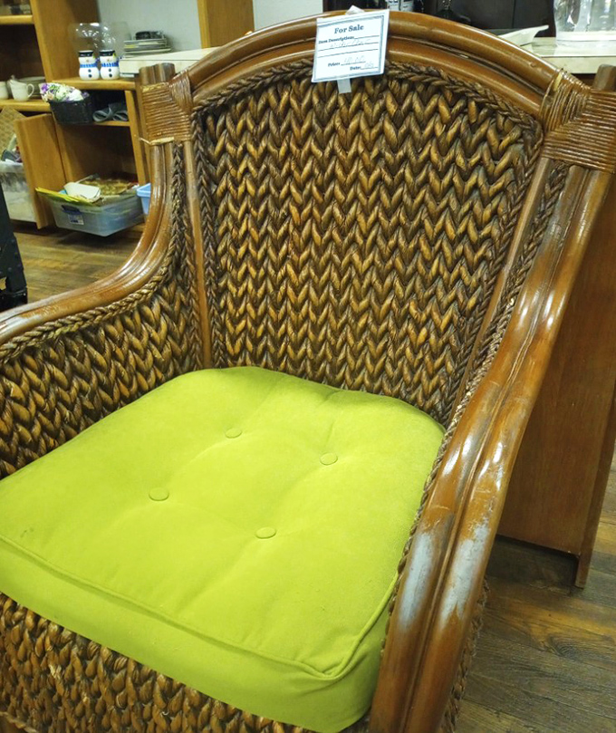 That lime green cushion transforms this rattan chair from "someone's porch circa 1985" into "the reading nook your Instagram followers will envy."