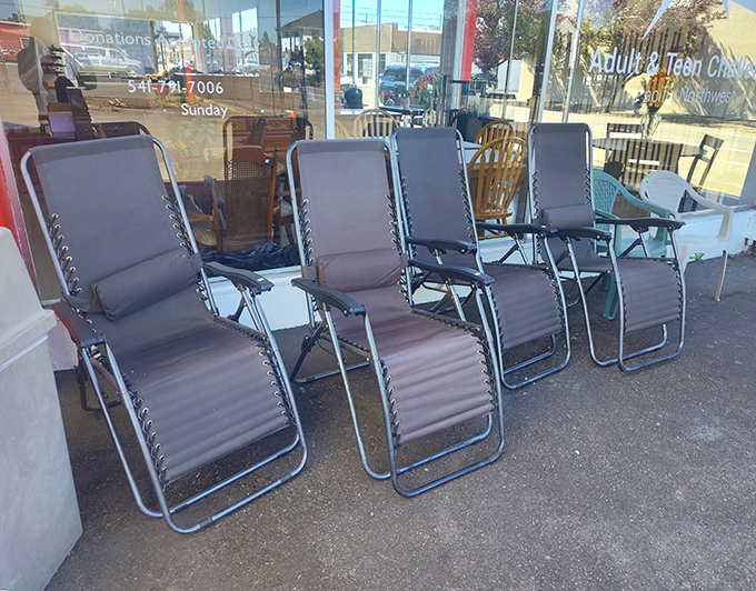 Patio chair paradise! These recliners are just waiting for someone to pair them with a cold beverage and a lazy Sunday afternoon.