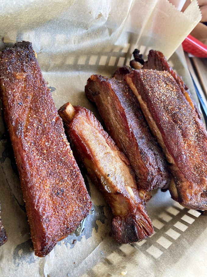 These ribs have the kind of smoke ring that makes barbecue enthusiasts weak in the knees. The perfect balance of tenderness and texture.