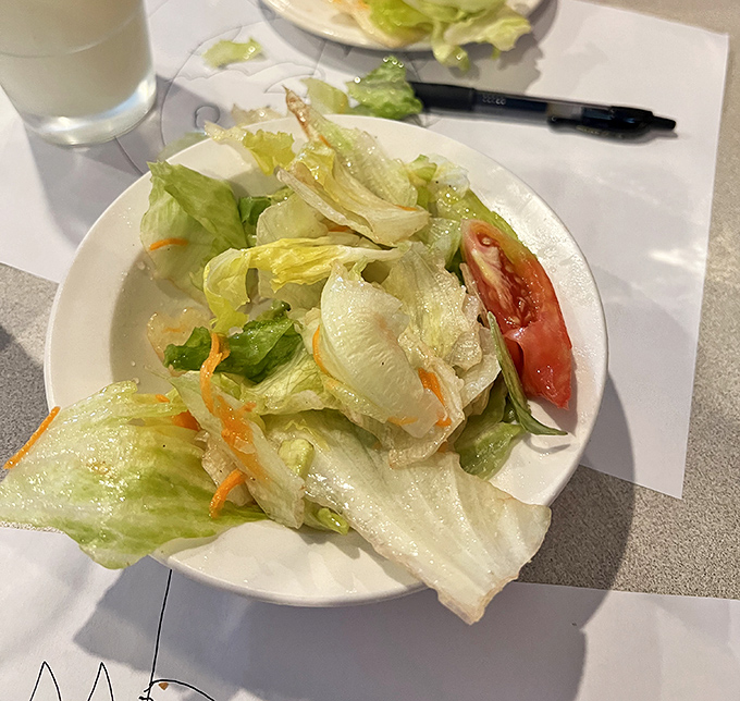 A salad that knows its role&mdash;the opening act that sets the stage without stealing the show. That tomato slice is the ruby in the crown.