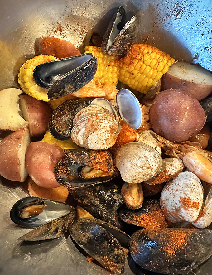 The seafood boil that launched a thousand napkins! Mussels, clams, corn, and potatoes swimming together in seasoned harmony&mdash;a beautiful mess worth making. 