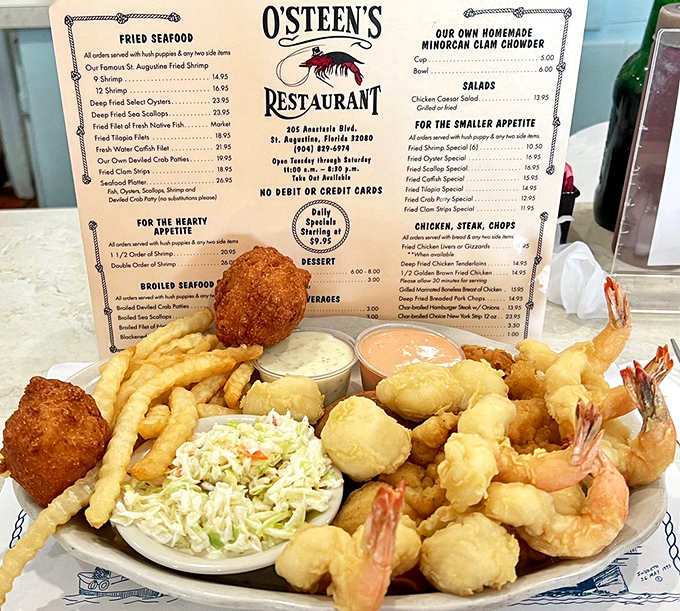When seafood meets comfort food&mdash;this platter showcases O'Steen's famous fried shrimp alongside crispy hush puppies and their legendary coleslaw.
