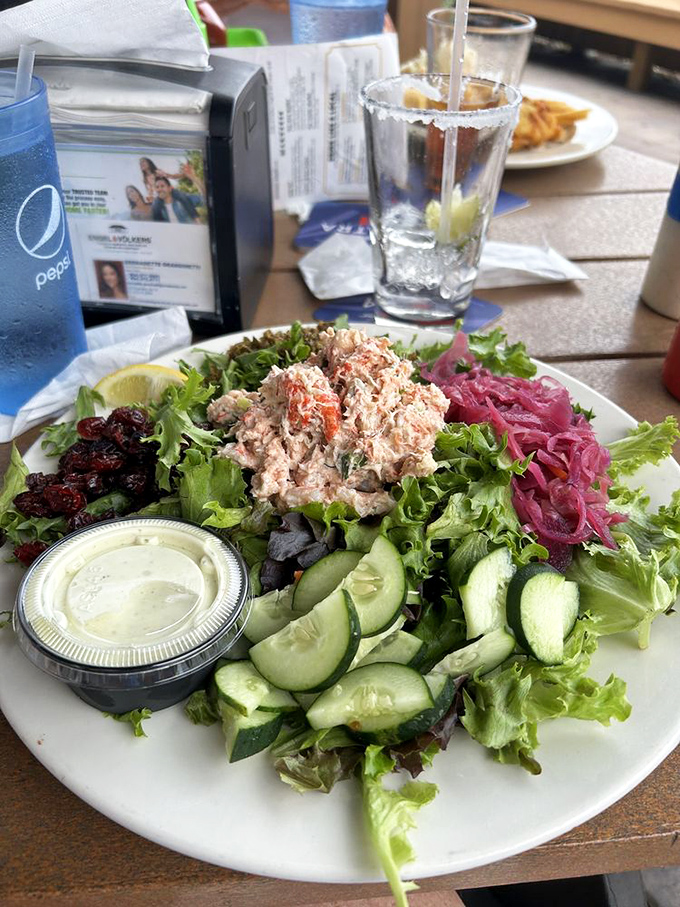 A seafood salad that proves healthy eating doesn't mean punishment &ndash; fresh greens, cucumber, and seafood create a vacation on a plate.