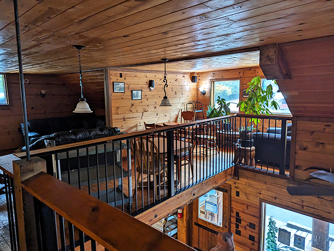 The second-floor dining area offers a treehouse vibe for grown-ups, where pine-scented air mingles with coffee aromas in perfect mountain harmony.