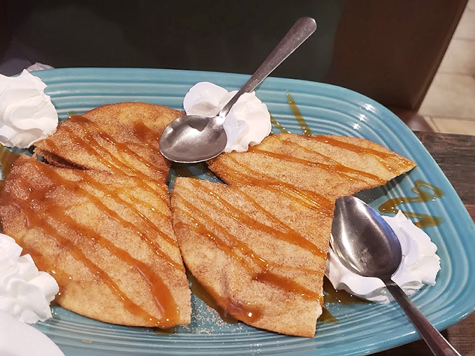 Golden-brown sopapillas drizzled with honey and topped with whipped cream&mdash;proof that the simplest desserts often deliver the most profound happiness.