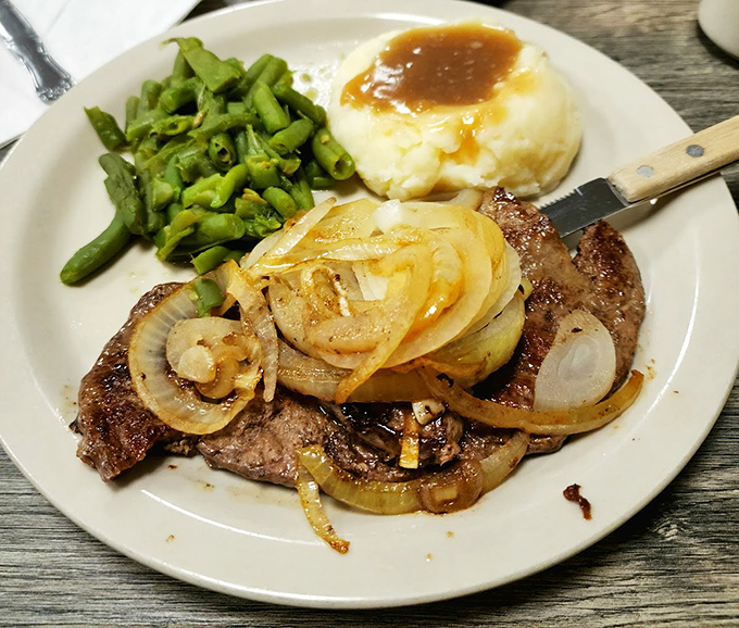 Steak and onions with a side of green beans &ndash; proof that sometimes the simplest combinations are the most satisfying. Grandpa would approve.