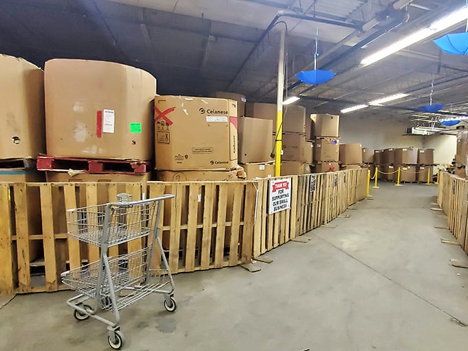 Behind the literary curtain: where books wait for their second act. That shopping cart isn't for groceries&mdash;it's for hauling your paper-and-ink treasures to their forever home.