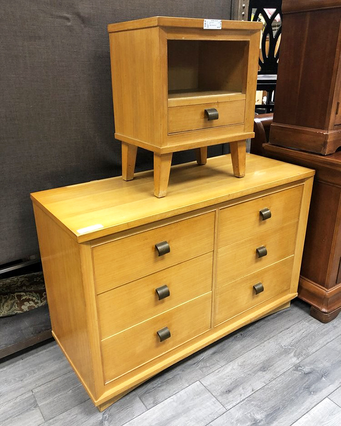 Mid-century magic in wood form. This dresser and nightstand combo is the kind of furniture that makes interior designers do a double-take.