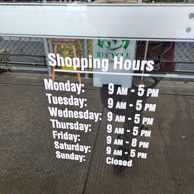 The store hours sign&mdash;your roadmap to thrifting nirvana. Note Friday's extended hours, perfect for post-work retail therapy sessions.