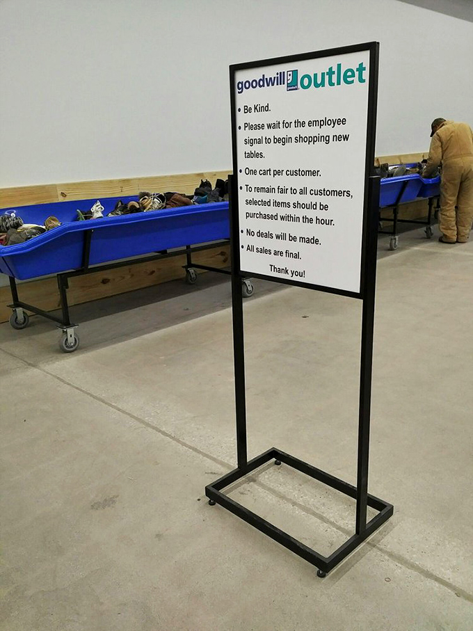 The rules of engagement for Goodwill's outlet section &ndash; a gentle reminder that thrifting is both sport and art form.