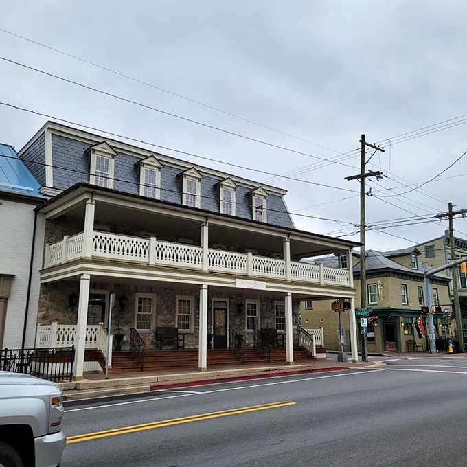 This stately building with its double-decker porch stands as a testament to the architectural grandeur of bygone eras.
