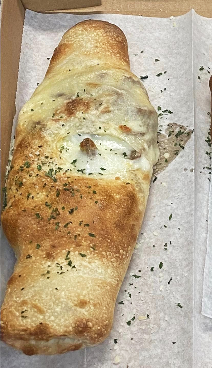 A stromboli rolled tighter than my jeans after Thanksgiving &ndash; and worth every glorious bite.