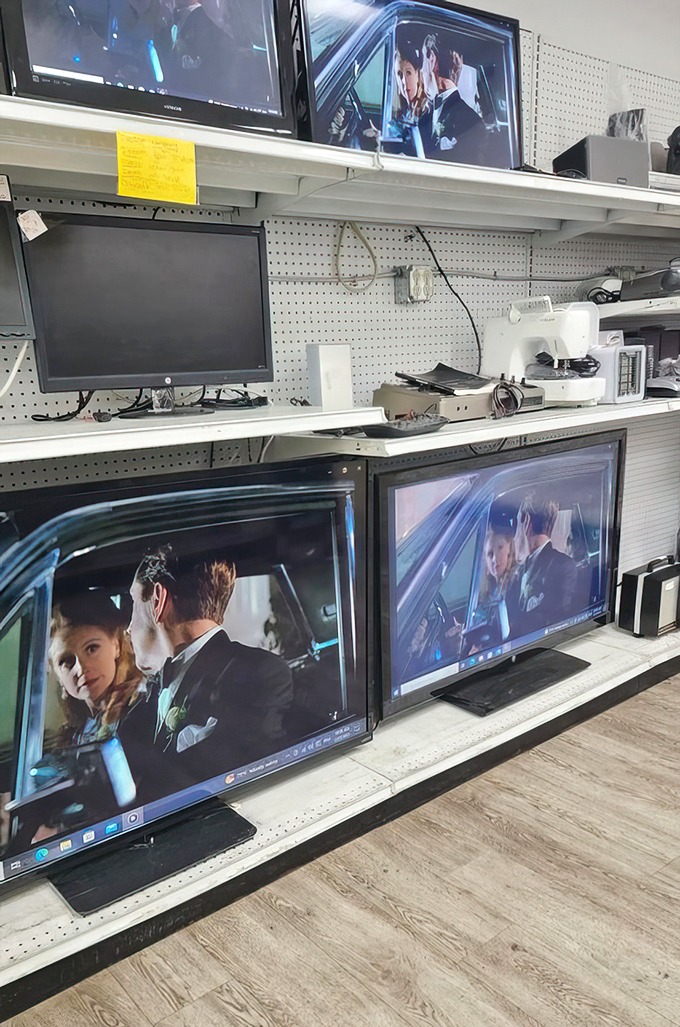 Flat screens line up like a discount electronics showroom where entertainment upgrades won't drain your savings.