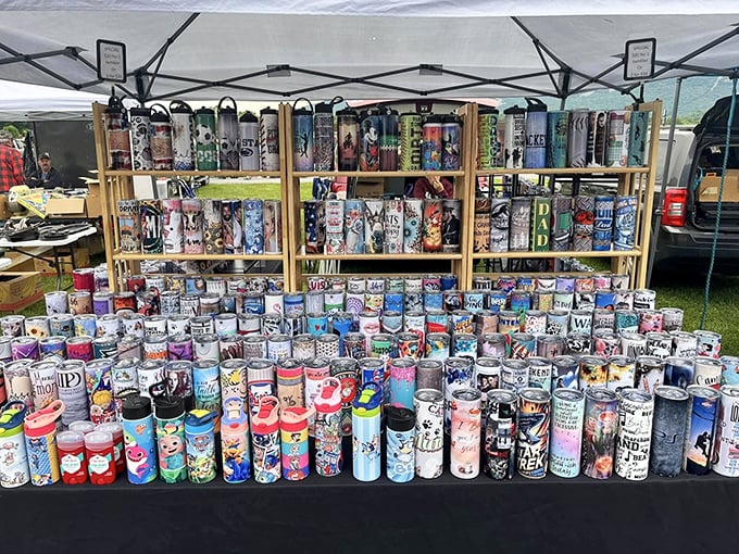 The tumbler collector's dream – a rainbow of insulated cups promising to keep your coffee hot through even the longest flea market expedition.