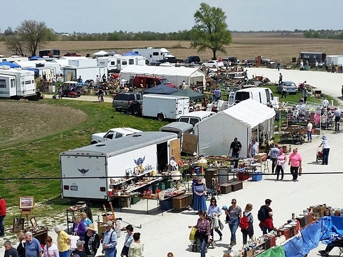 The market sprawls across the fairgrounds like a pop-up neighborhood, where shoppers become urban explorers hunting for that perfect find.