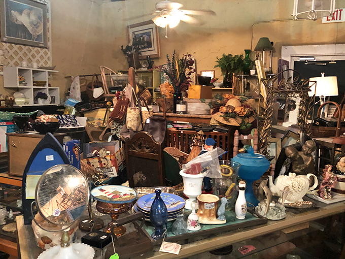 Organized chaos at its finest! This jumble of treasures is like a physical manifestation of your grandmother's most interesting stories.