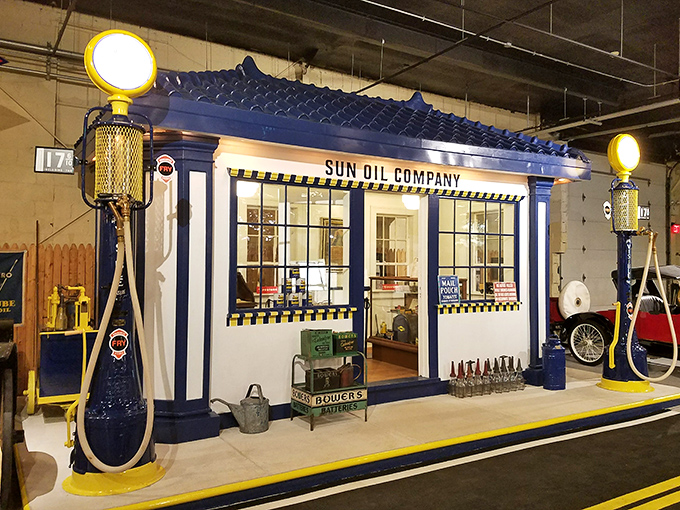 The Sun Oil Company station gleams with nostalgic perfection, from a time when gas station attendants knew your name and checked your oil without being asked.