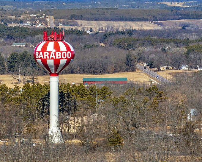 The candy-striped water tower stands like a circus big top on stilts, announcing "Baraboo" to travelers long before GPS tells them they've arrived.