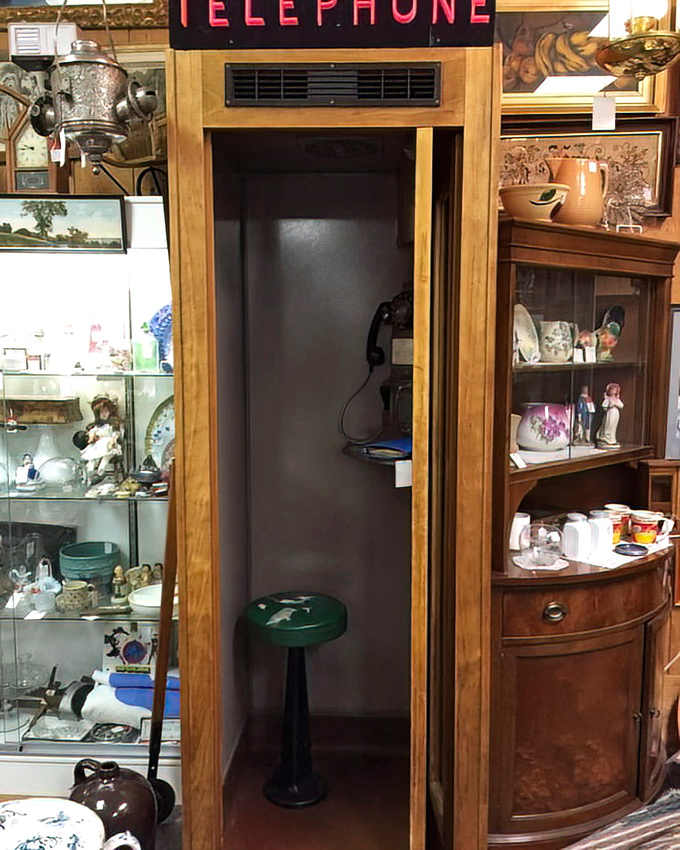 Step into this vintage phone booth and pretend you're Superman changing identities, not just checking your Instagram.