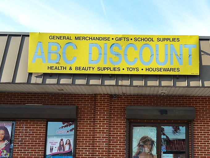 ABC Discount's bright yellow sign is as cheerful as the deals you'll find inside. A rainbow of beauty products awaits!