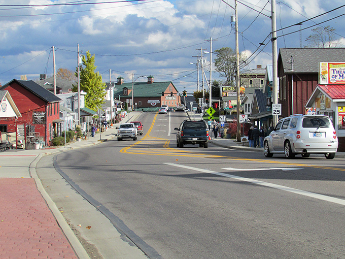 Berlin's bustling main street lined with shops - where "downtown" means you can still find a hitching post for your horse.