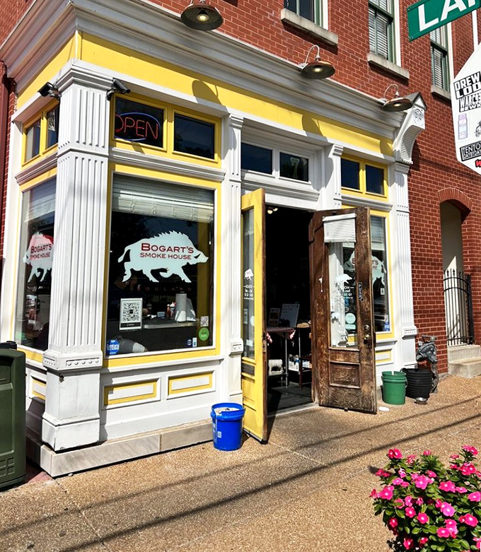 Those cheerful yellow accents brighten up the neighborhood like sunshine, promising warmth and comfort food inside.