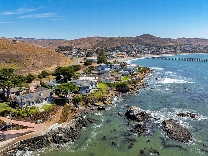 Cayucos stretches lazily from highway to ocean like a cat sunbathing in perpetual vacation mode.
