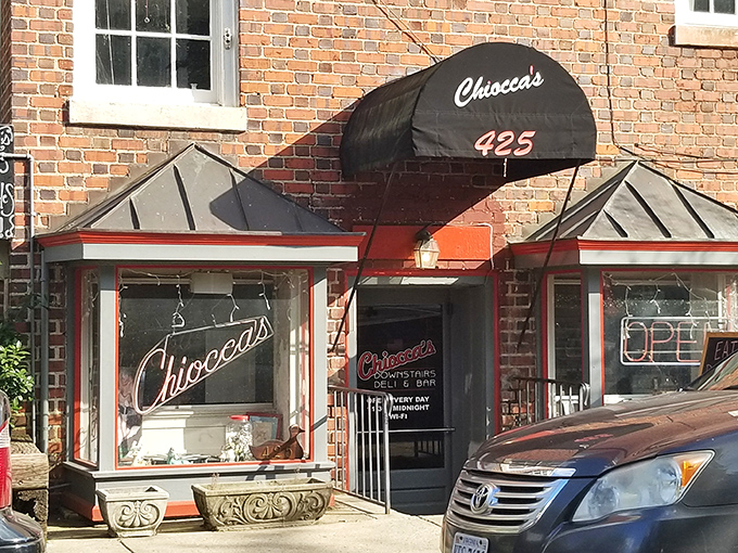 Chiocca's brick exterior and classic awning hint at old-school sandwich perfection. That neon sign has guided hungry folks for generations.