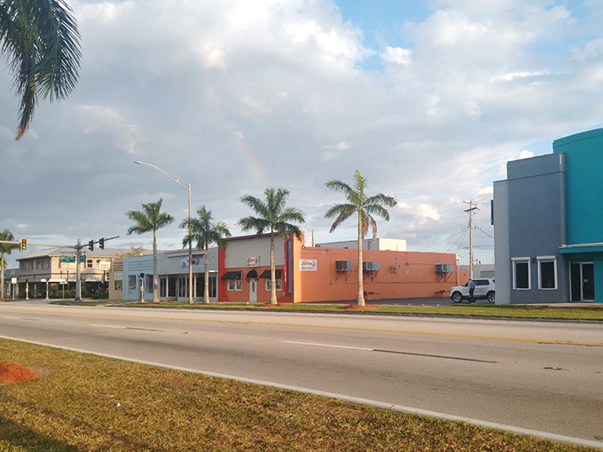 Clewiston's colorful downtown buildings bring cheer to everyday errands, with a rainbow arching overhead as if blessing this affordable community.