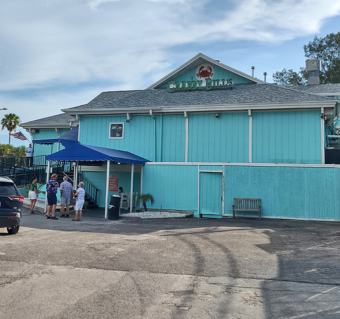 Crabby Bill's turquoise exterior matches the Gulf waters it overlooks. This St. Pete Beach landmark is where seafood meets vacation mode.