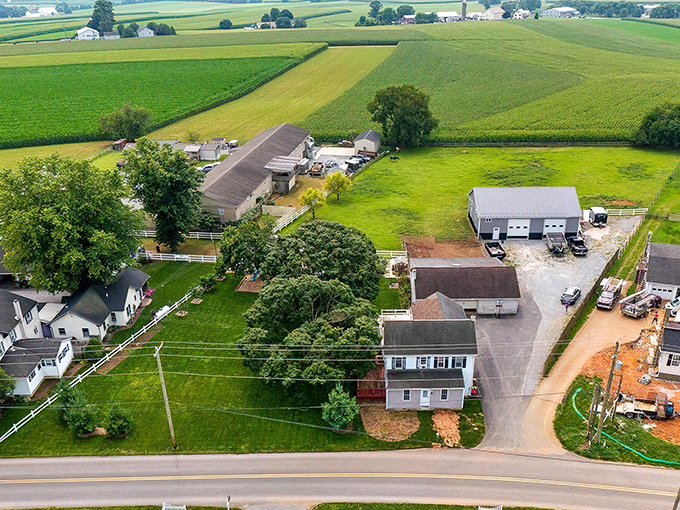 Gordonville's aerial view reveals the perfect balance of farmland and homesteads, where fields stretch toward the horizon.
