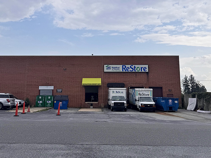 Industrial brick meets community purpose where building supplies and household treasures coexist in perfect harmony.