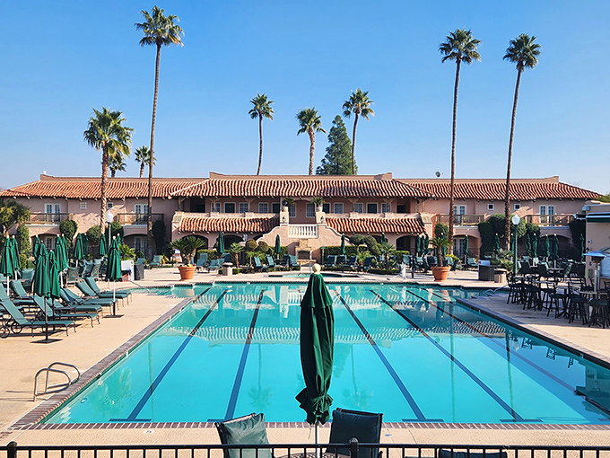 Palm trees and Spanish architecture create an oasis where ranch-fresh beef meets California elegance perfectly.